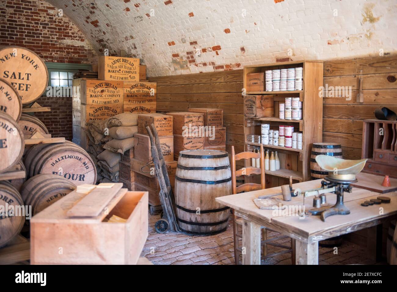 Barrels labeled "vinegar, salt beef, rice, flour, salt, molasses ...