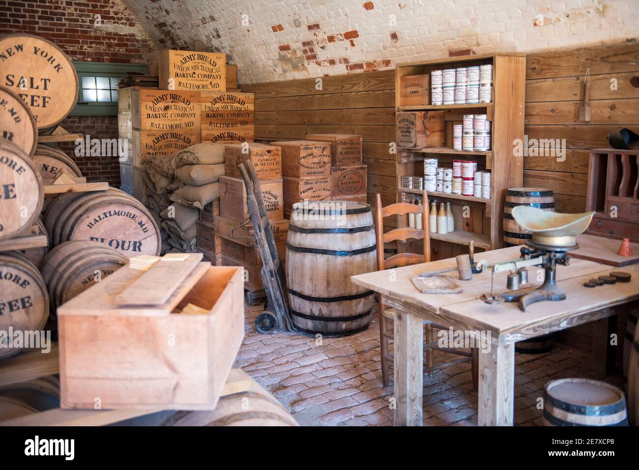 Barrels labeled "vinegar, salt beef, rice, flour, salt, molasses ...