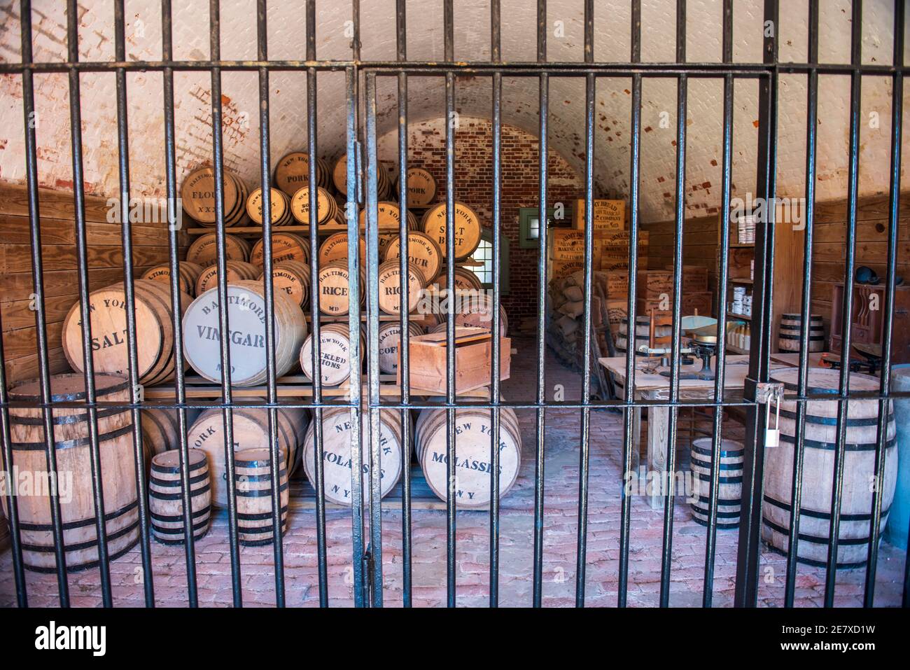 Barrels labeled "vinegar, salt beef, rice, flour, salt, molasses ...