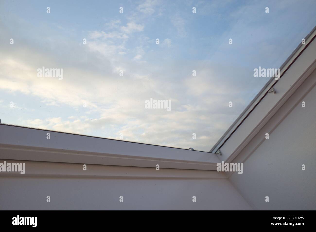 Interior view and close-up detail at closed white Tilt Window Skylights ...