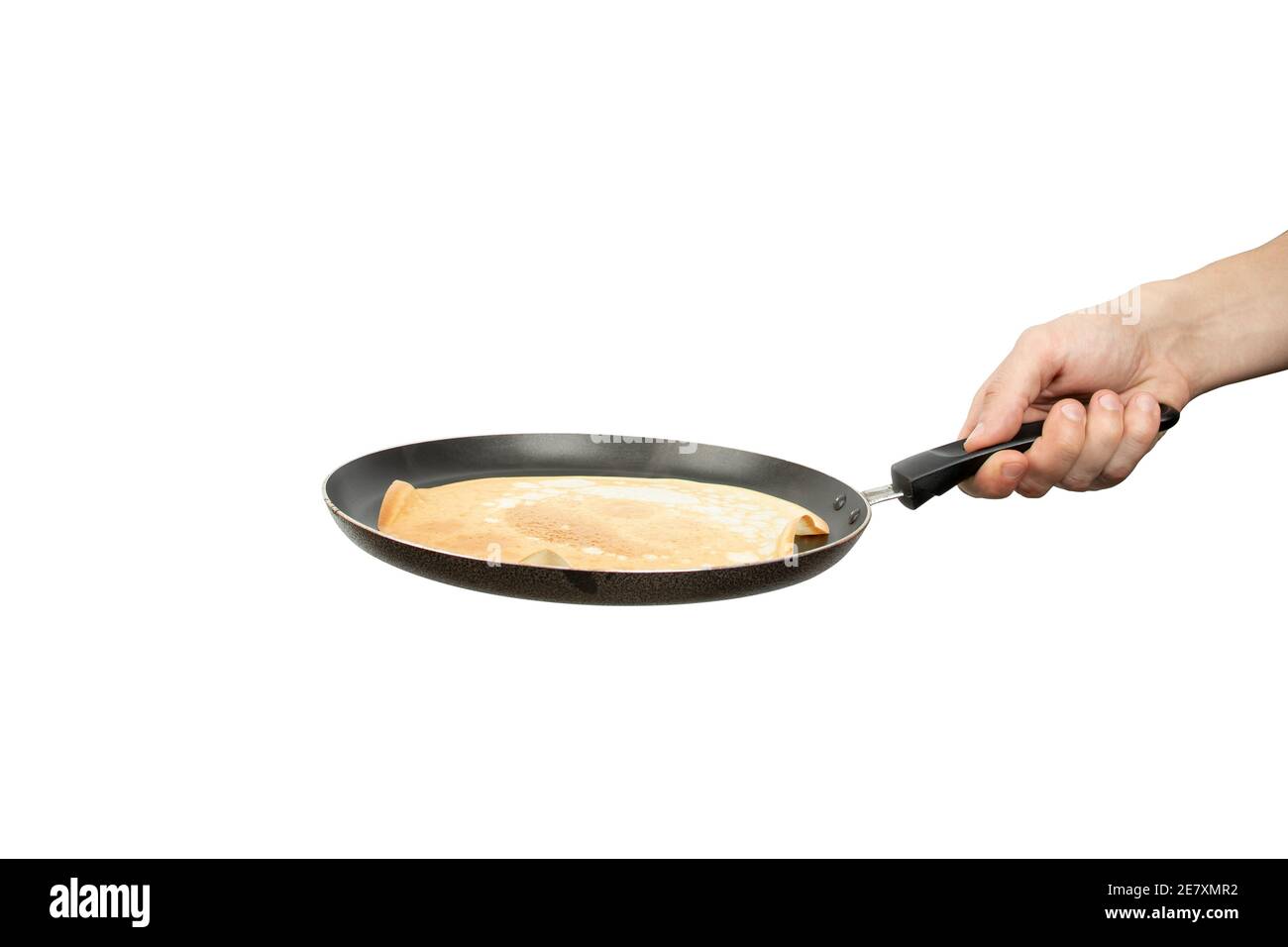 person holds frying pan with a pancake. isolated on white background ...