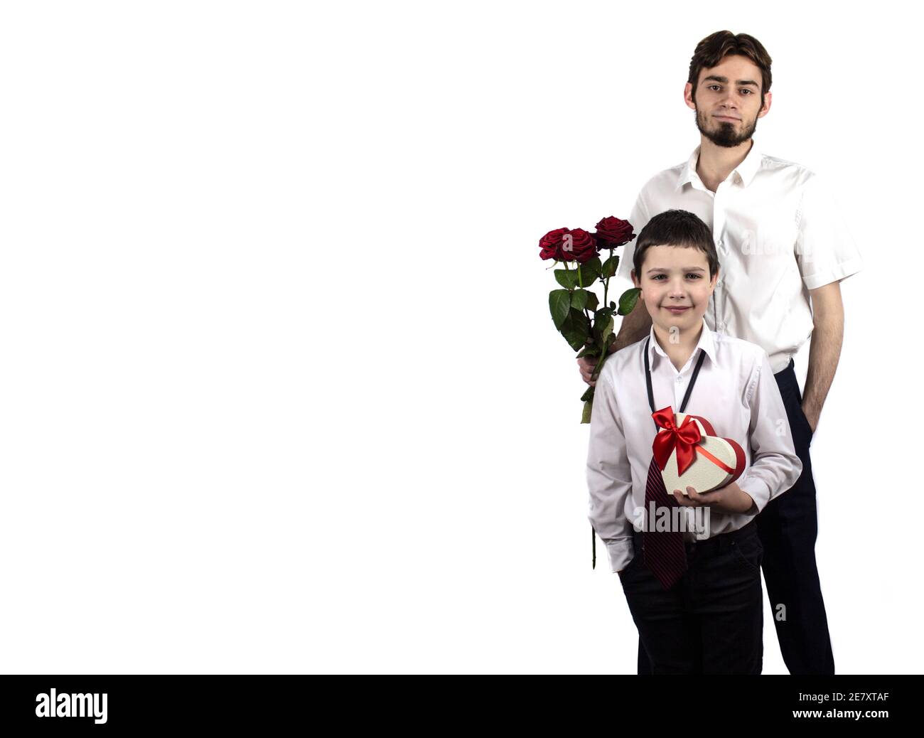 Valentine's Day. concept Valentine's Day. Two guys with roses and a ...