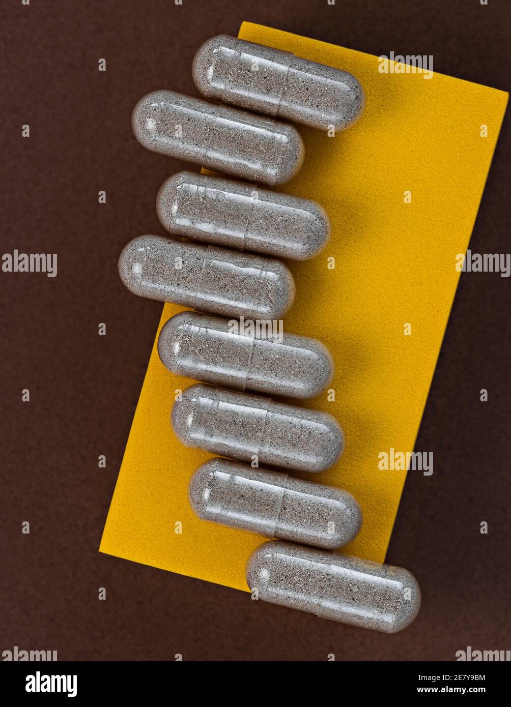 close-up of slippery elm capsules. dietary concept. dietary supplement ...