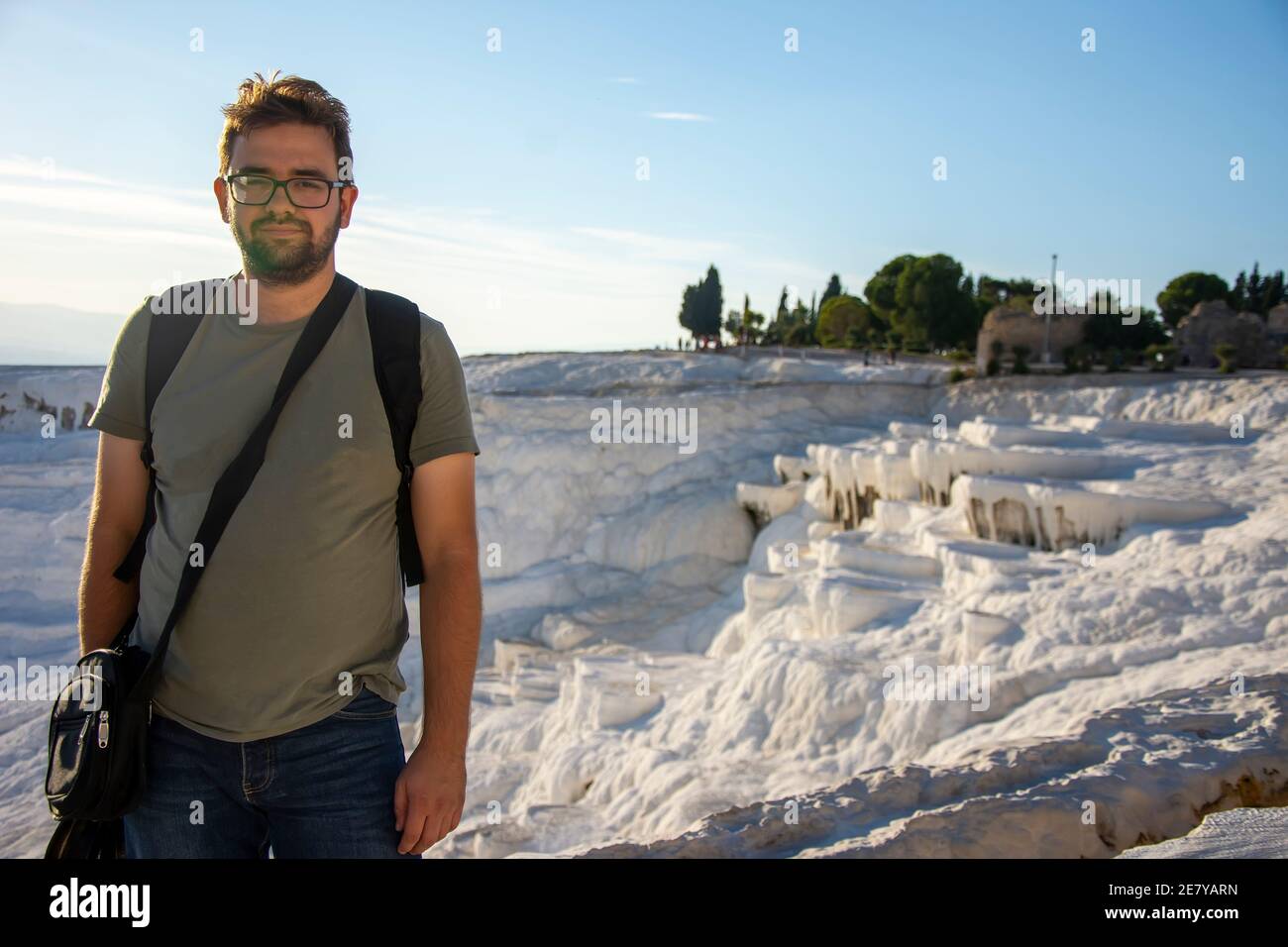 Happy tourist man at Pamukkale. Summer tourism in Turkey, famous ...