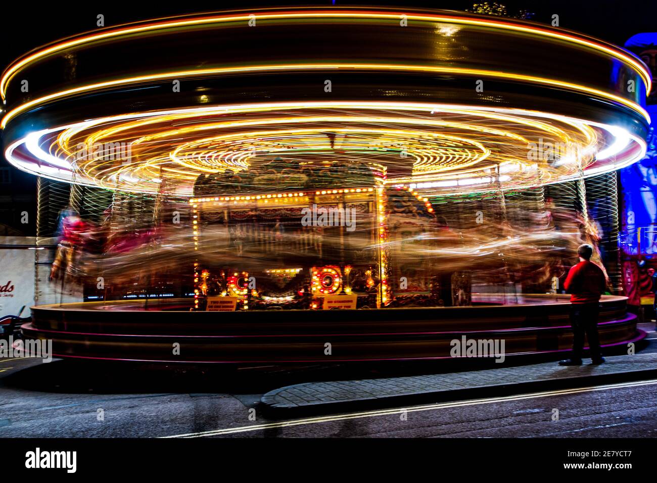 Fairground Carousel long exposure Stock Photo - Alamy
