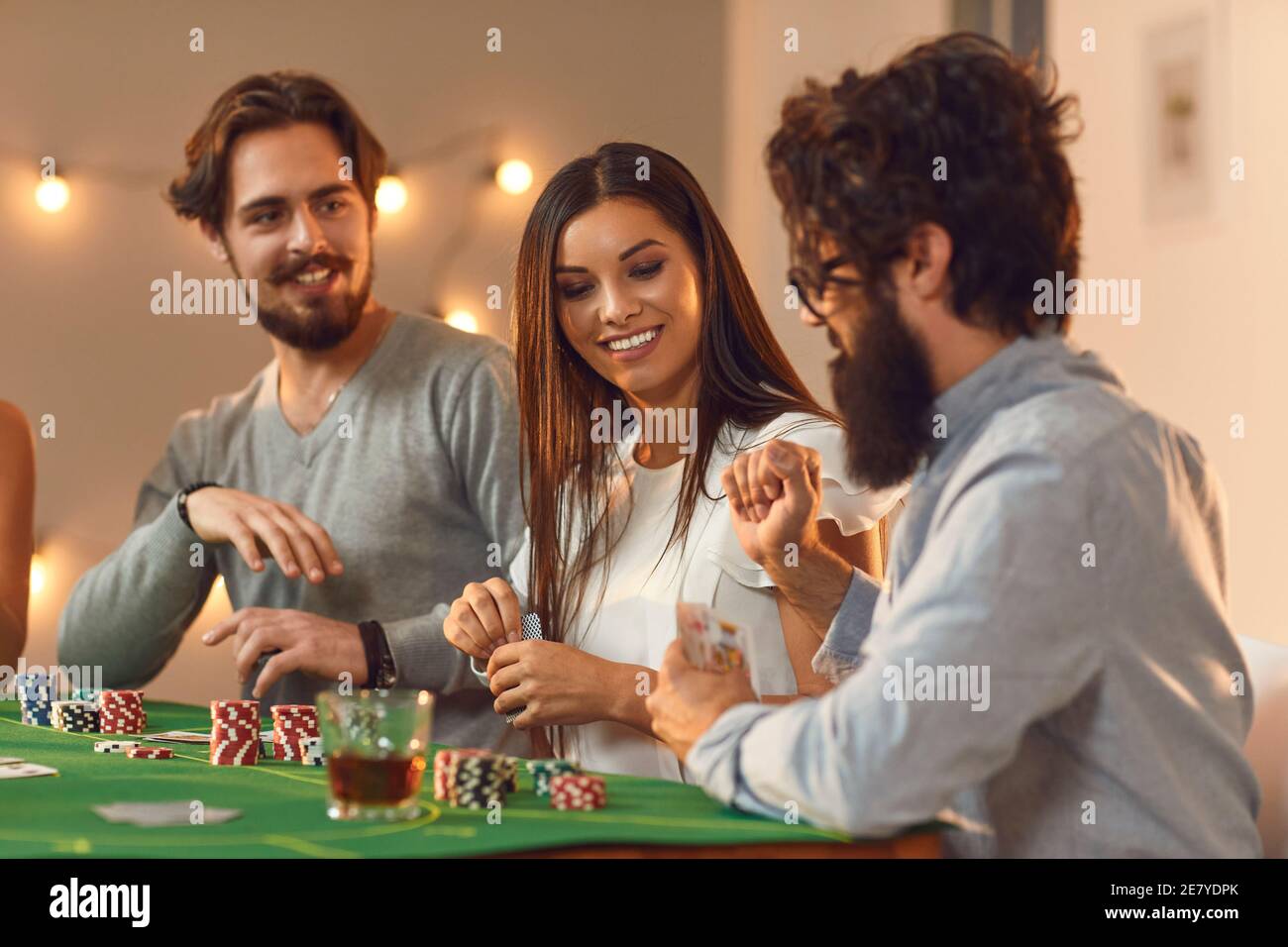 People sitting poker table playing hi-res stock photography and images ...