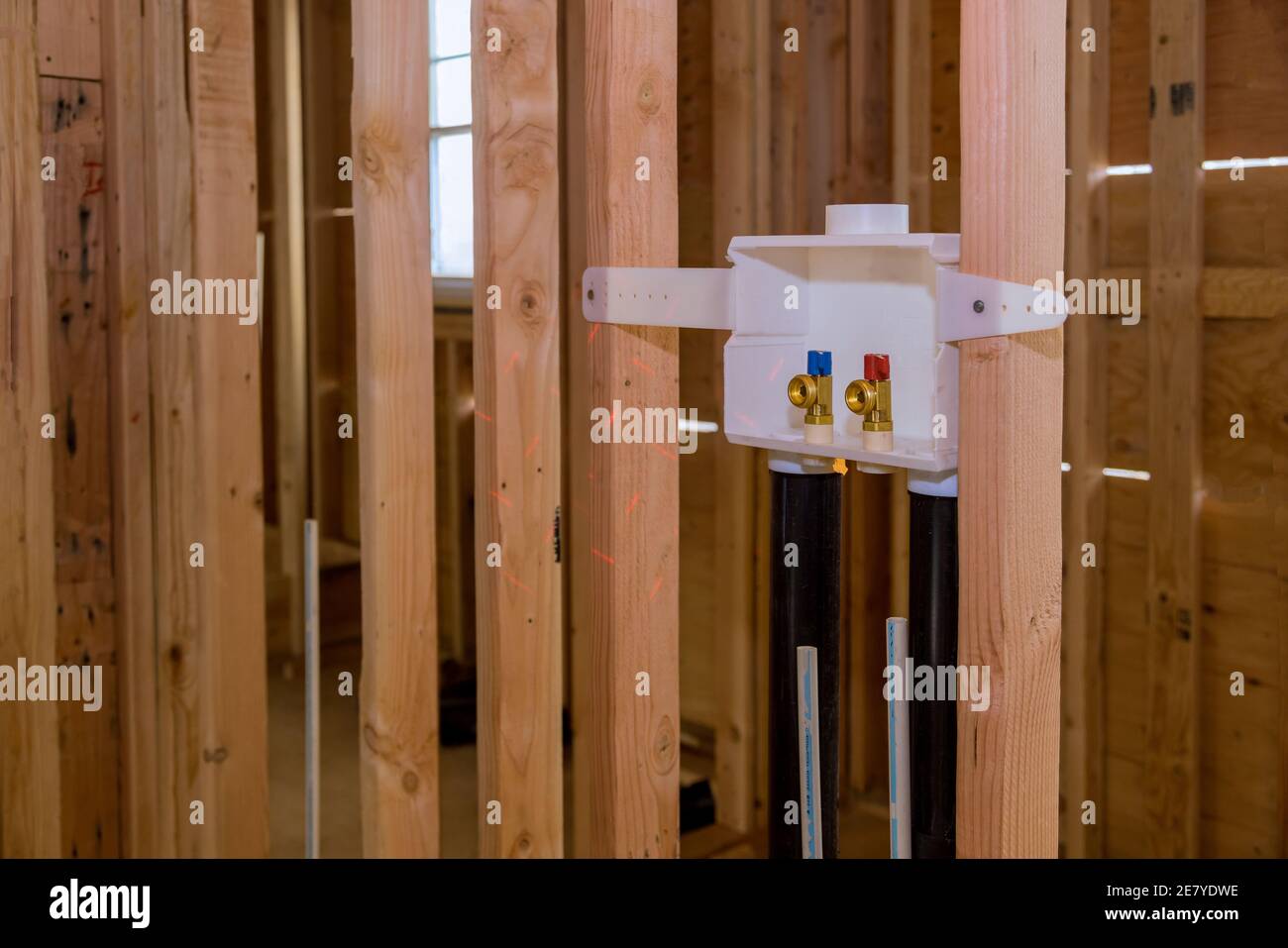 Installation of a laundry outlet boxes in a new house for connection of ...