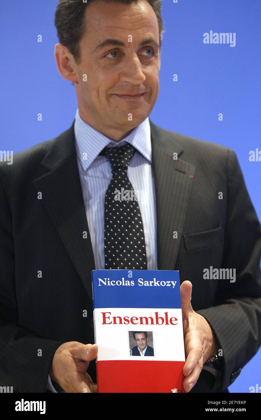 UMP leader and candidate Nicolas Sarkozy presents his presidential ...