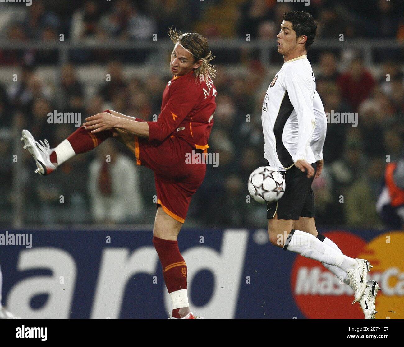 AS Roma's Philippe Mexes challenges Manchester United's Cristiano ...