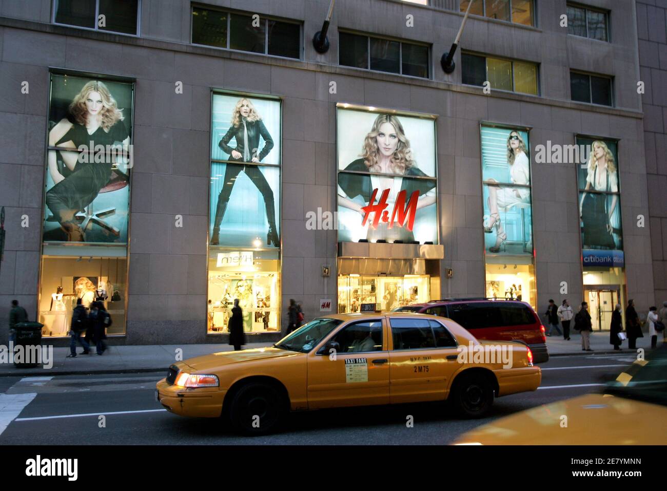 A window displays M By Madonna clothes collection at the Manhattan H&M ...