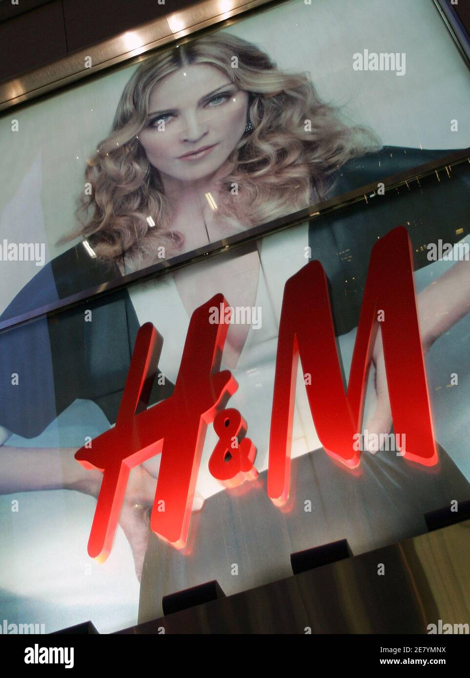 A window displays M By Madonna clothes collection at the Manhattan H&M ...