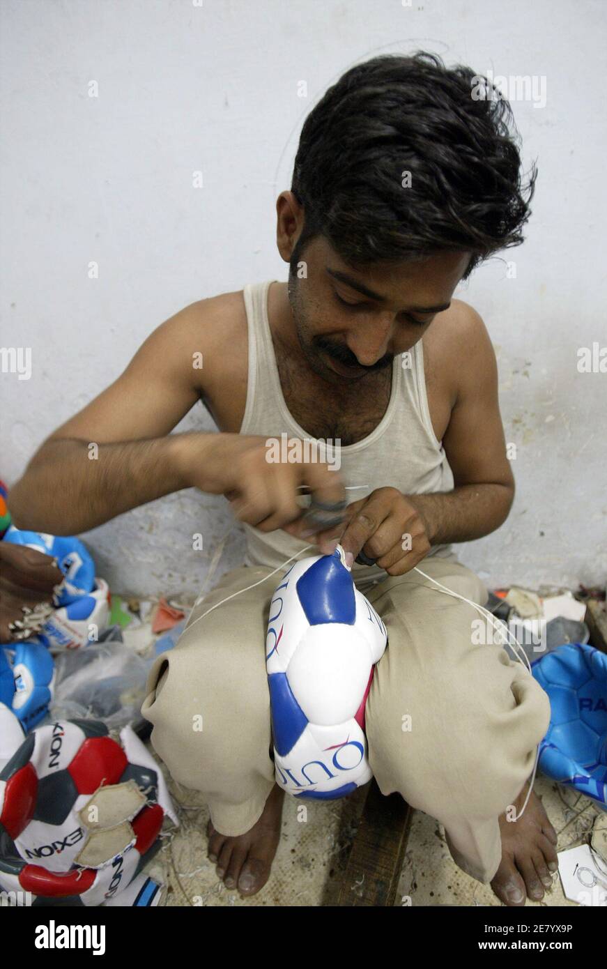 Football ball factory hi-res stock photography and images - Alamy