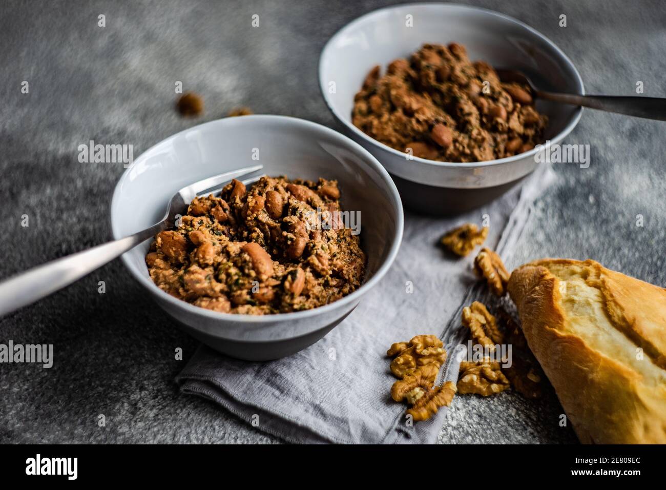Traditional georgian bean dish - lobio with walnut, served in modern ...