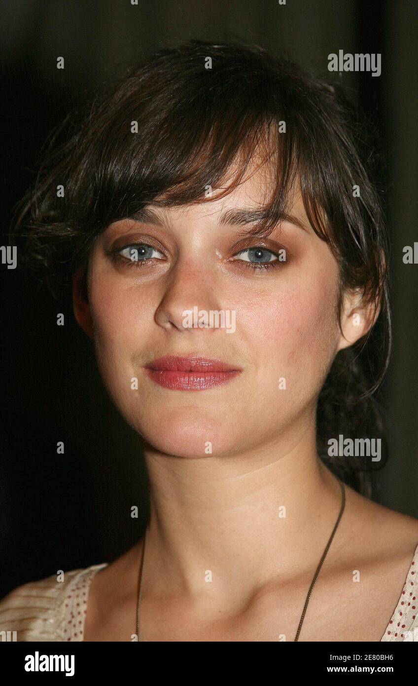 French actress Marion Cotillard poses during the 'La mome' film party ...
