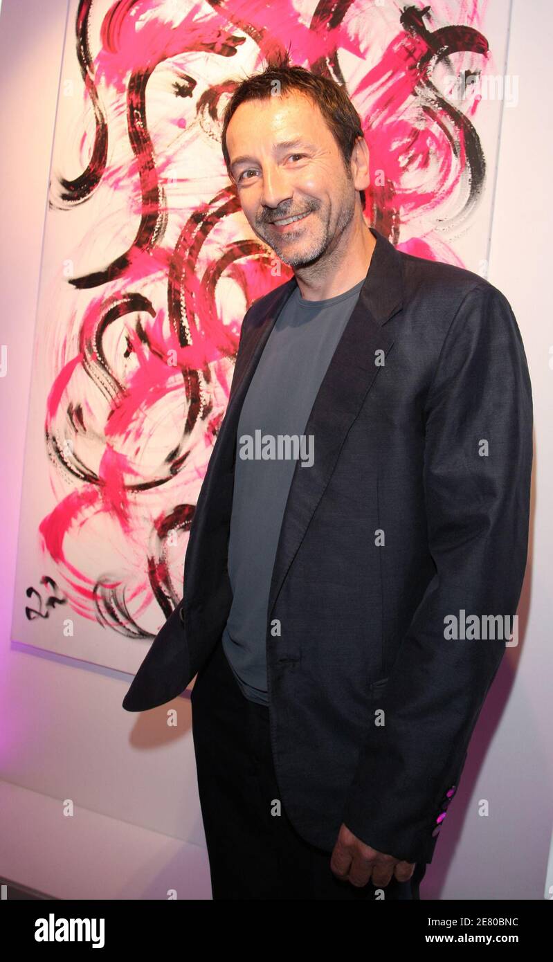French actor Jean-Hugues Anglade attends the exhibition opening of ...