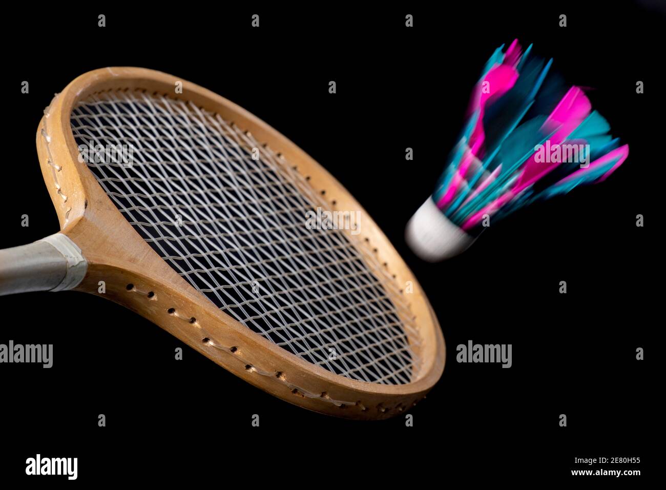 Wooden badminton racket and shuttlecock with feathers. Accessories for ...