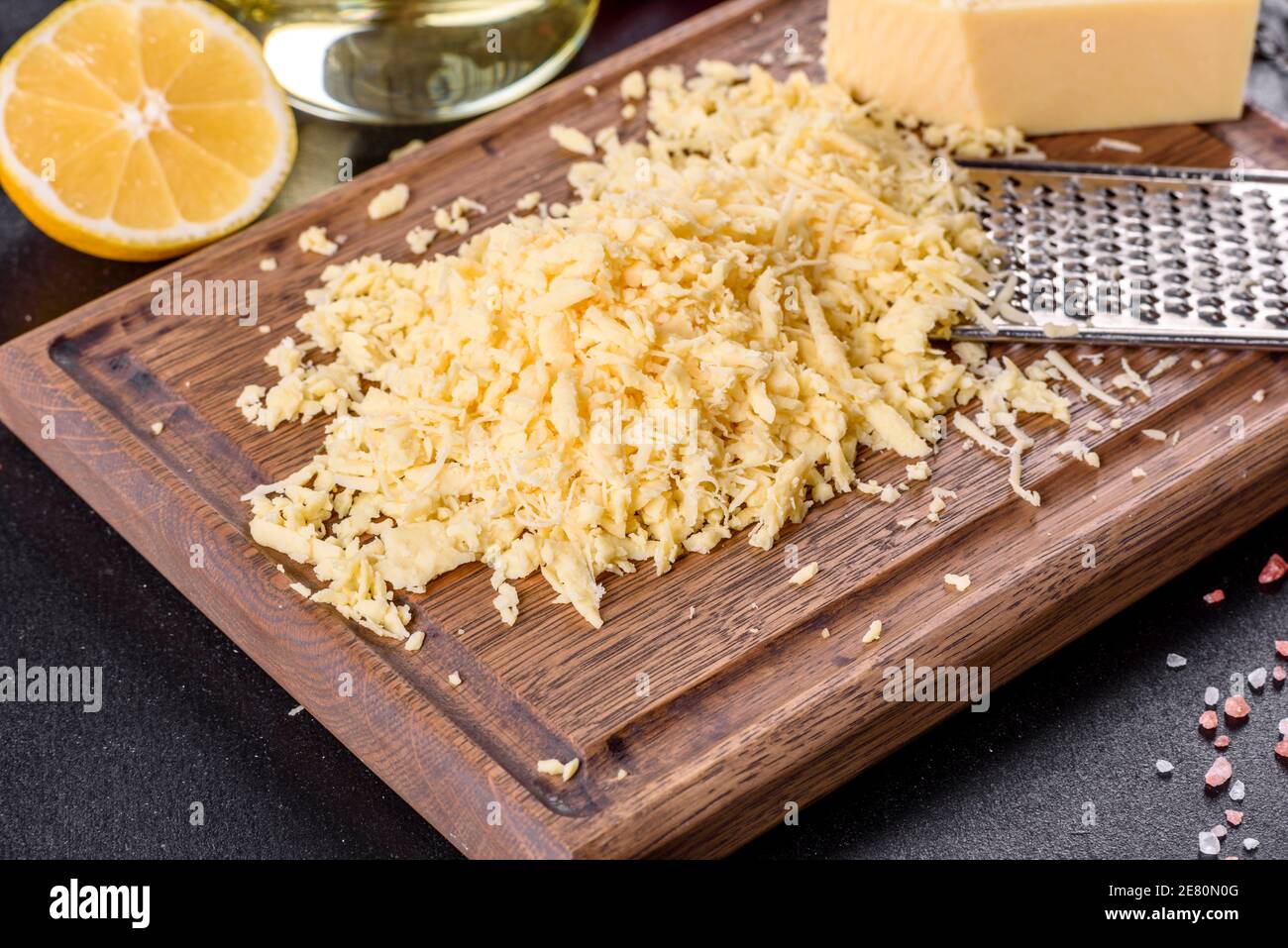 Pile grated cheddar cheese cheddar cheese block hi-res stock ...