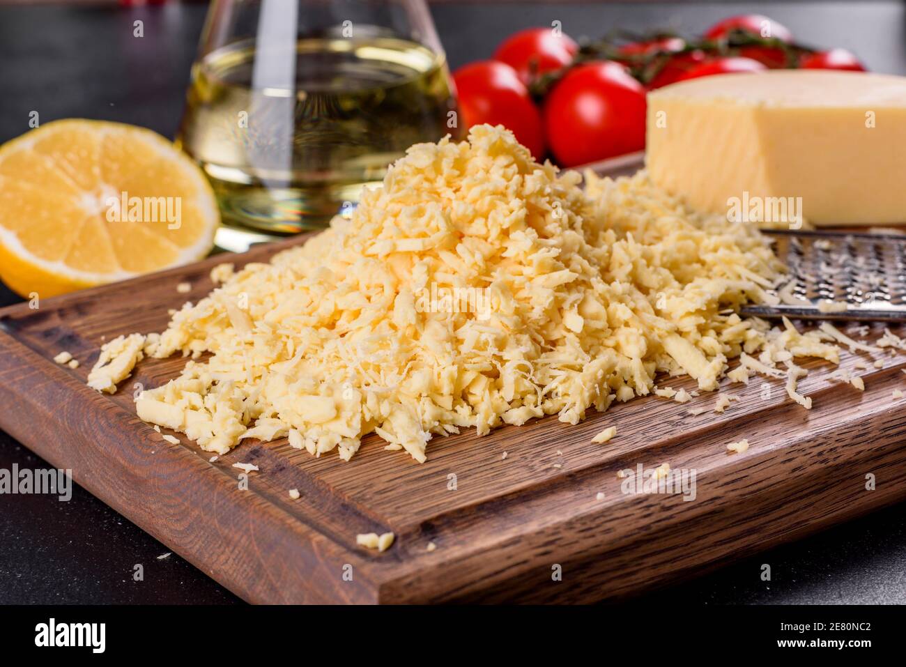 Pile grated cheddar cheese cheddar cheese block hi-res stock ...
