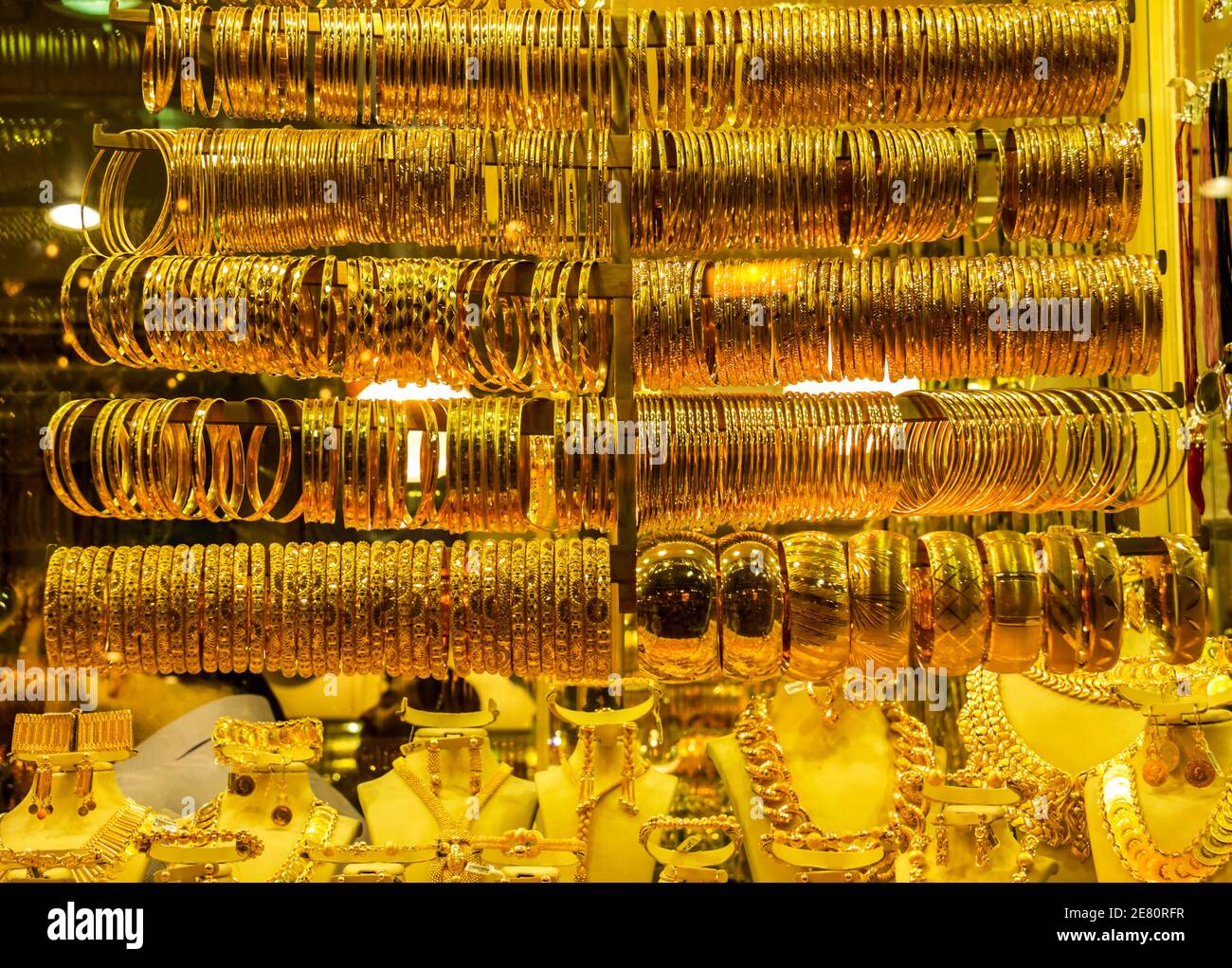 Rows of gold bracelets as a background in a jewelry store on the Grand ...