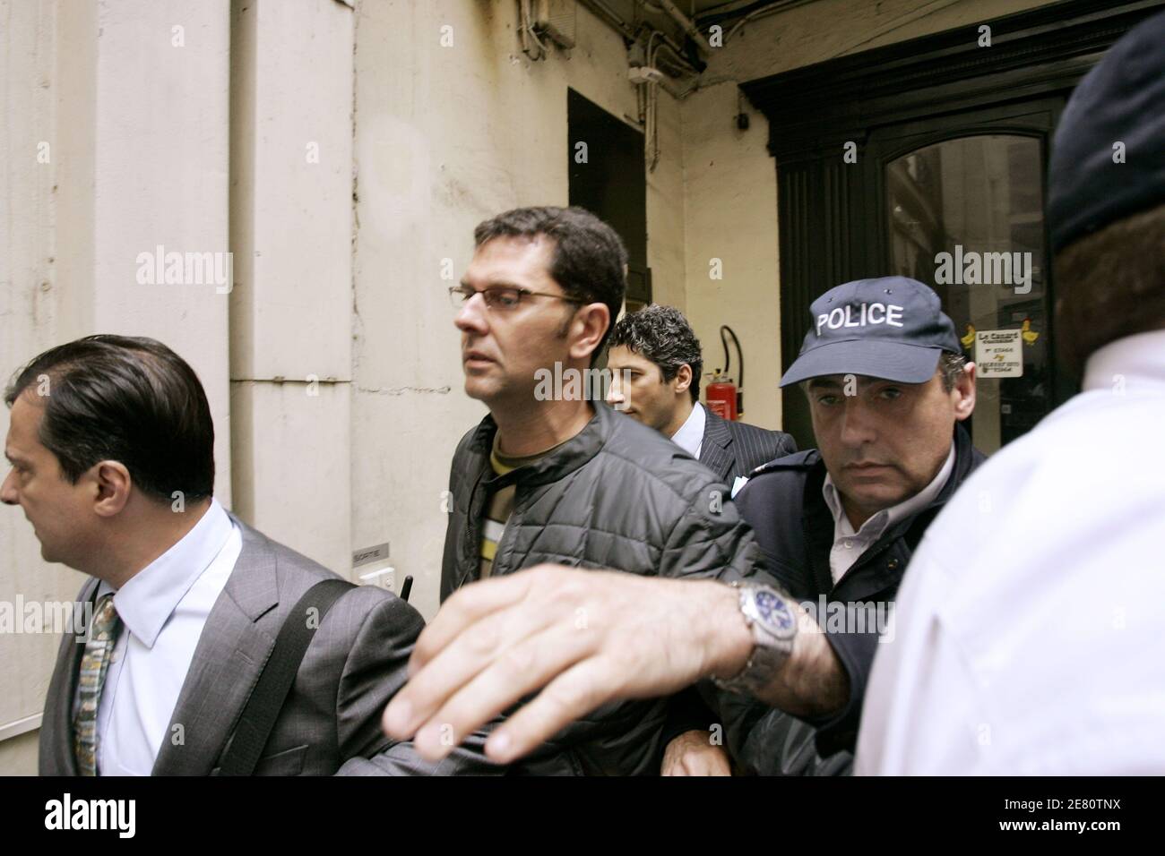 Judge Thomas Cassuto, pictured here in the back, wearing the striped ...