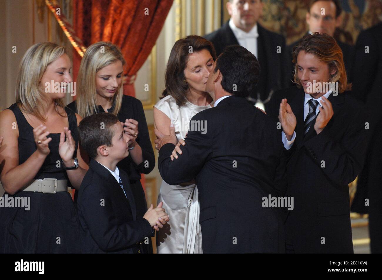 Cecilia Sarkozy stands with her children Judith, Jeanne-Marie and Louis ...