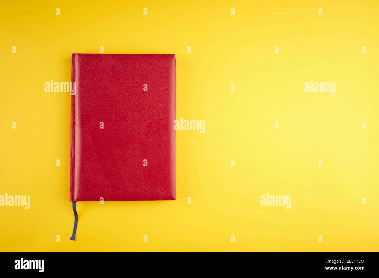 blank red leather diary on yellow trendy background. copy space. top ...
