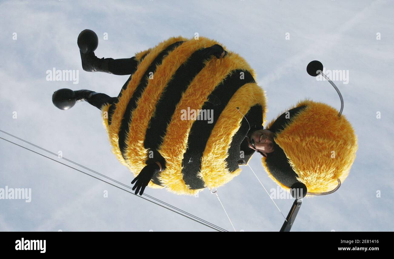 US actor Jerry Seinfeld, dressed as a giant bug, flies for the roof of ...