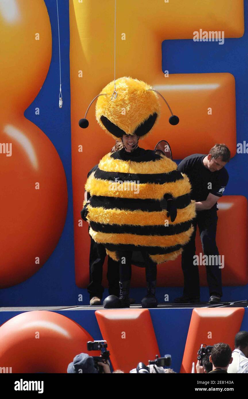 US actor Jerry Seinfeld, dressed as a giant bug, flies from the rook of ...