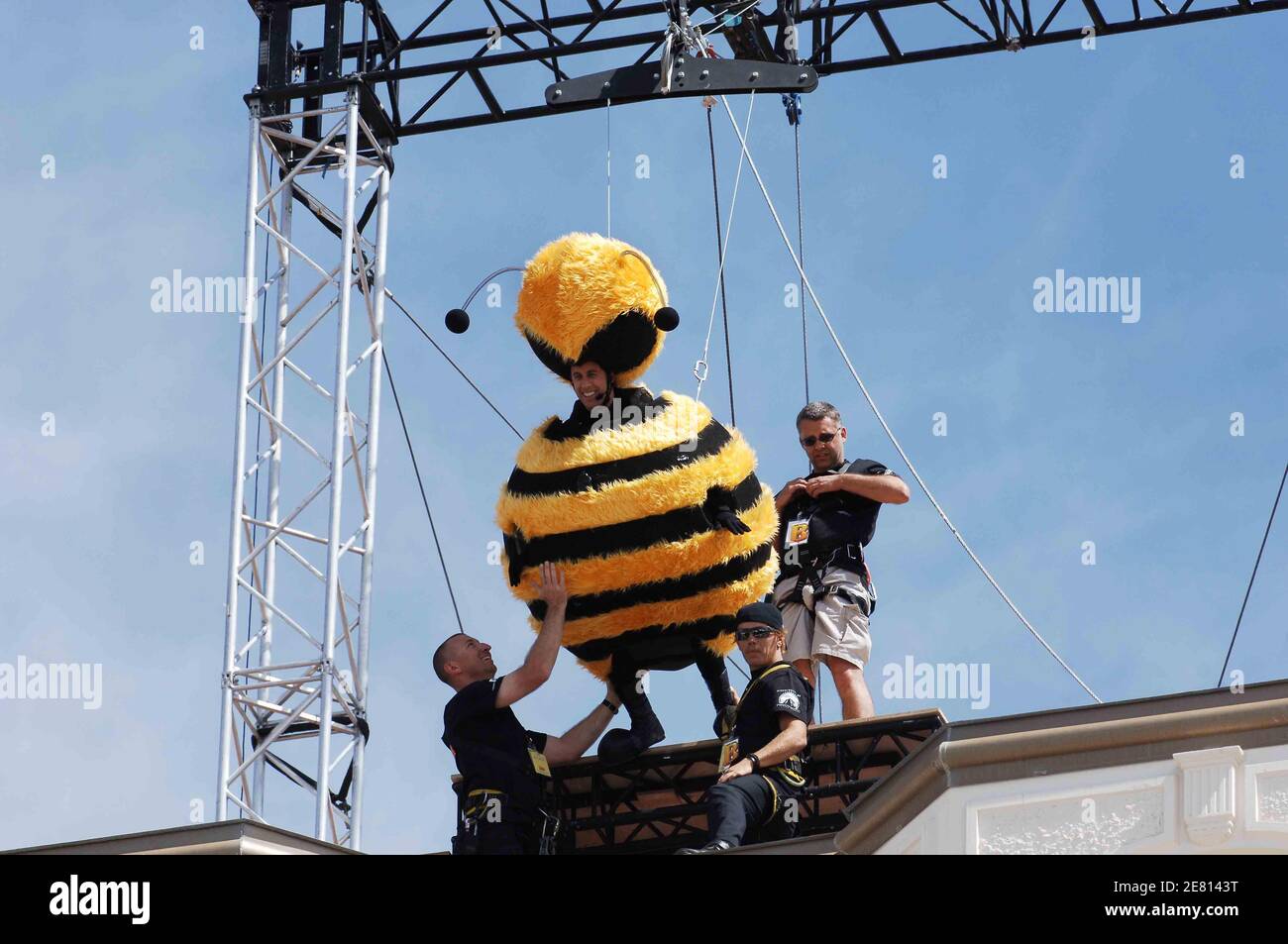 US actor Jerry Seinfeld, dressed as a giant bug, flies from the rook of ...