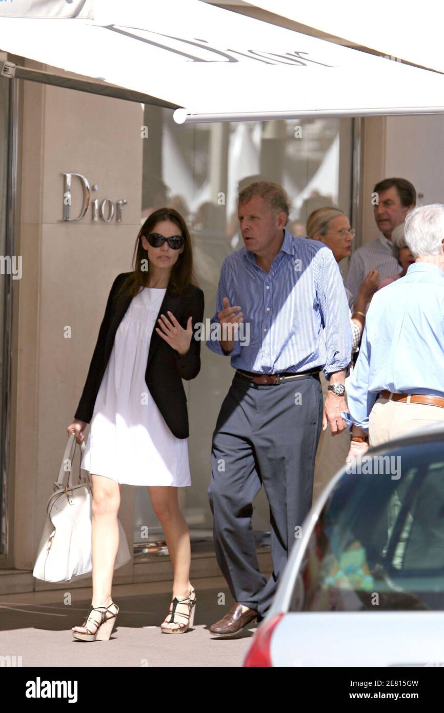 TV anchor Patrick Poivre d'Arvor walks with his girlfriend Agathe Borne ...