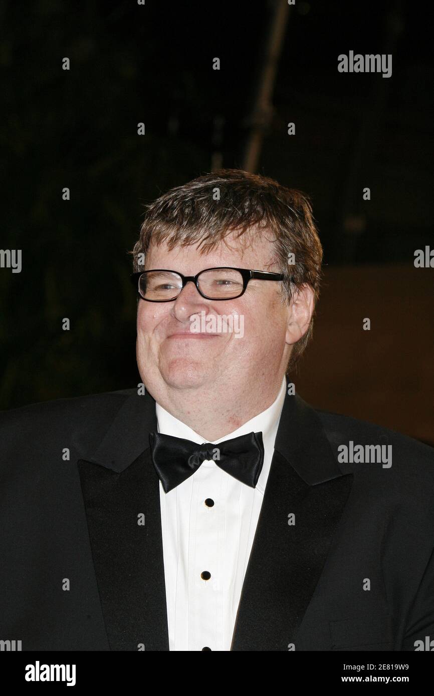 US director Michael Moore arrives to the Palais des Festivals for the ...