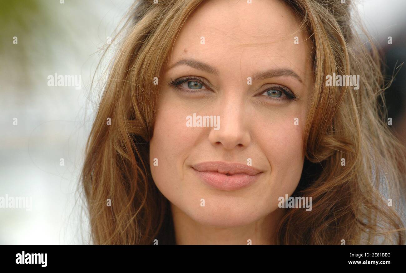 Actress Angelina Jolie poses at a photocall for the film A Mighty Heart ...