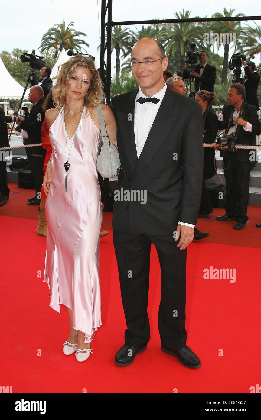 Bernard Werber and his wife walk the red carpet of the Palais des ...