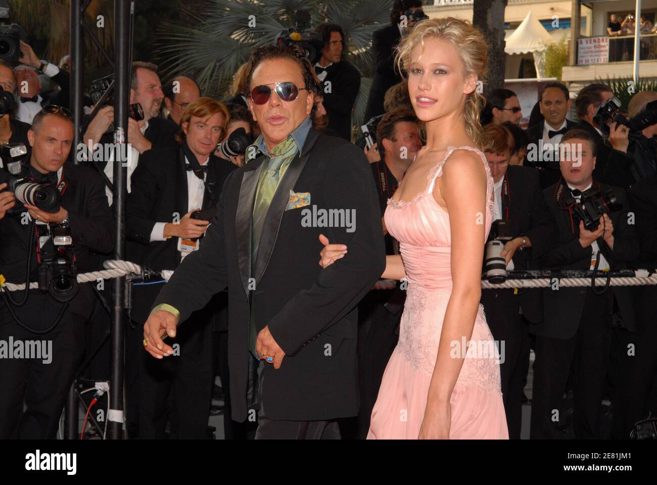 Actor Mickey Rourke and Christine Myers walk the red carpet of the ...