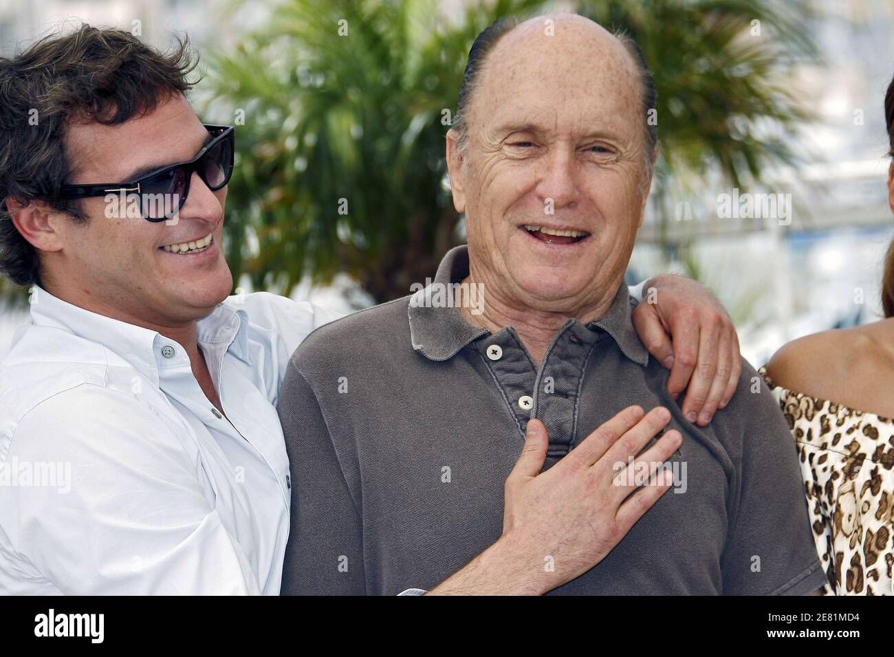 US actors Joaquin Phoenix (R) and Robert Duvall laugh during a ...