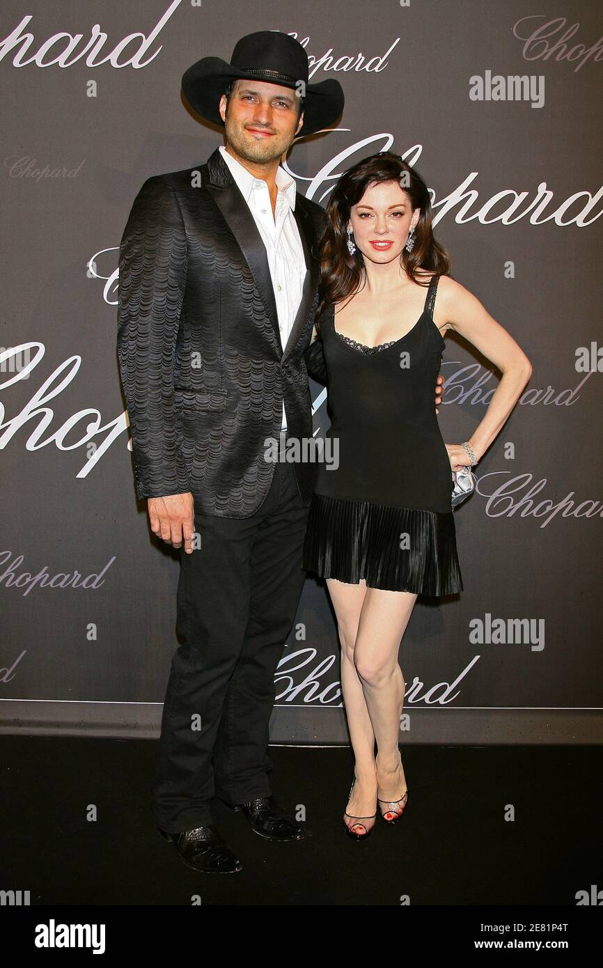 US producer Robert Rodriguez and actress Rose McGowan arrive at The ...