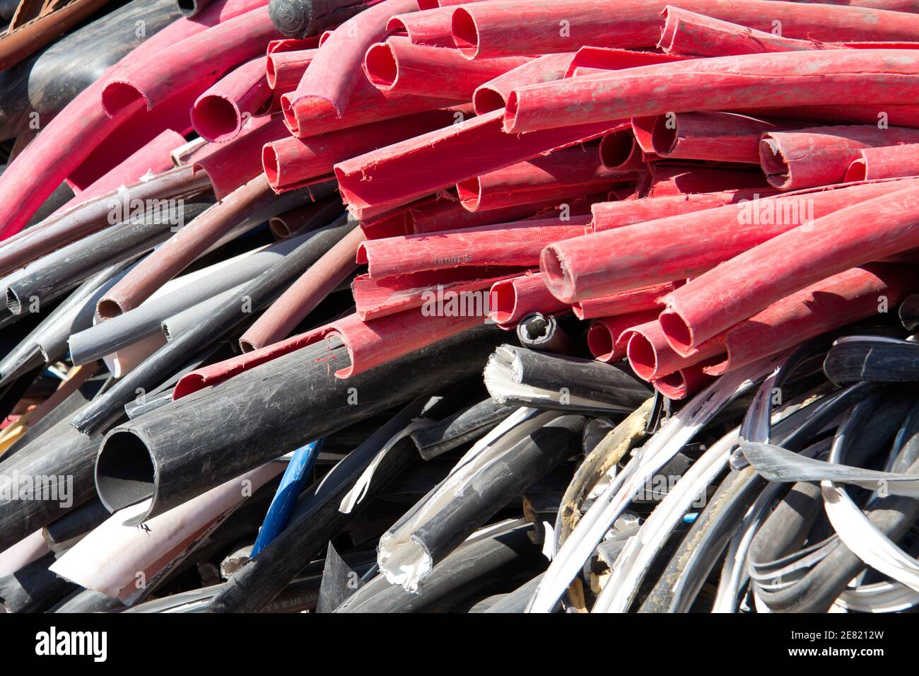 a pile of scrap plastic cables Stock Photo - Alamy
