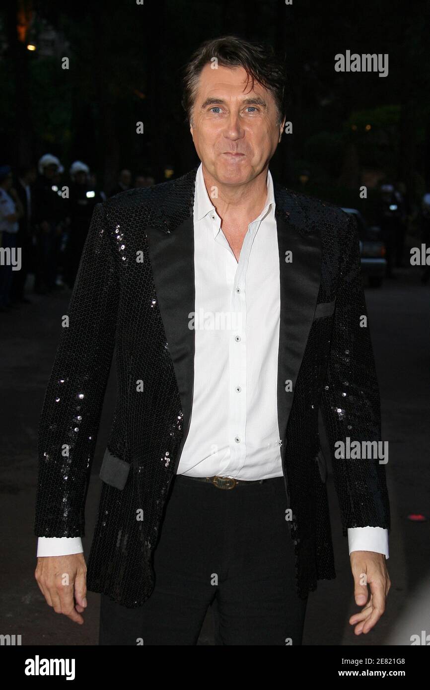 Singer Bryan Ferry poses for picture as he arrives at the 'Tenue de ...