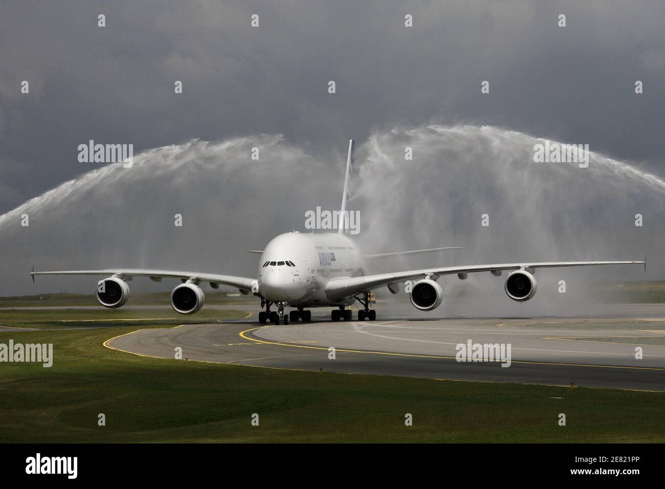 Fire-trucks send water on the Airbus A380, the new double-decker 555 ...