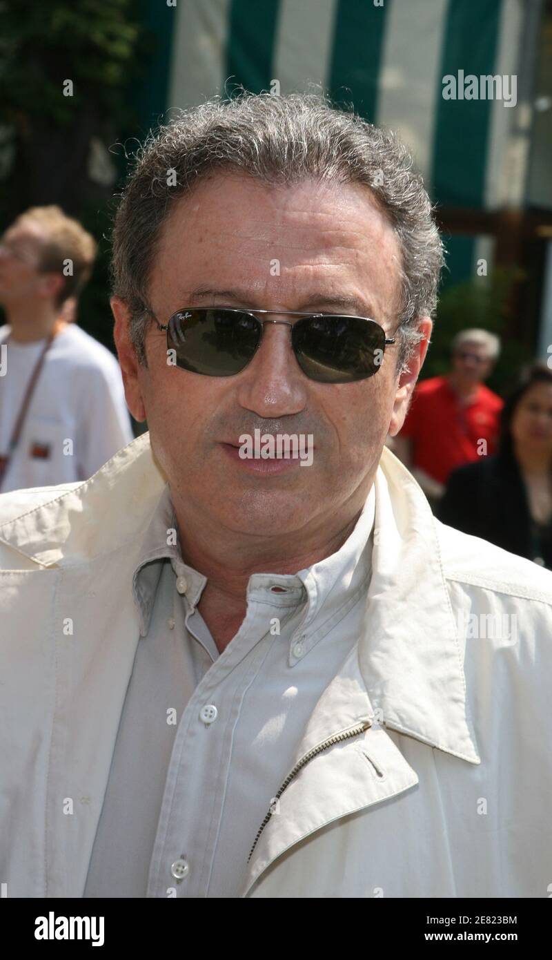 French TV presenter Michel Drucker poses in the 'Village', the VIP area ...