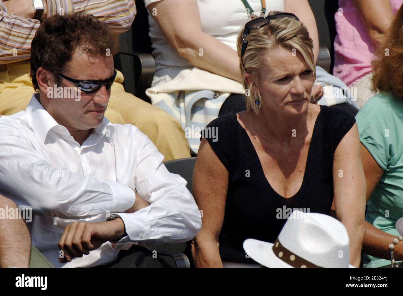French tv presenter Pierre Sled and his wife Sophie Davant attend the ...