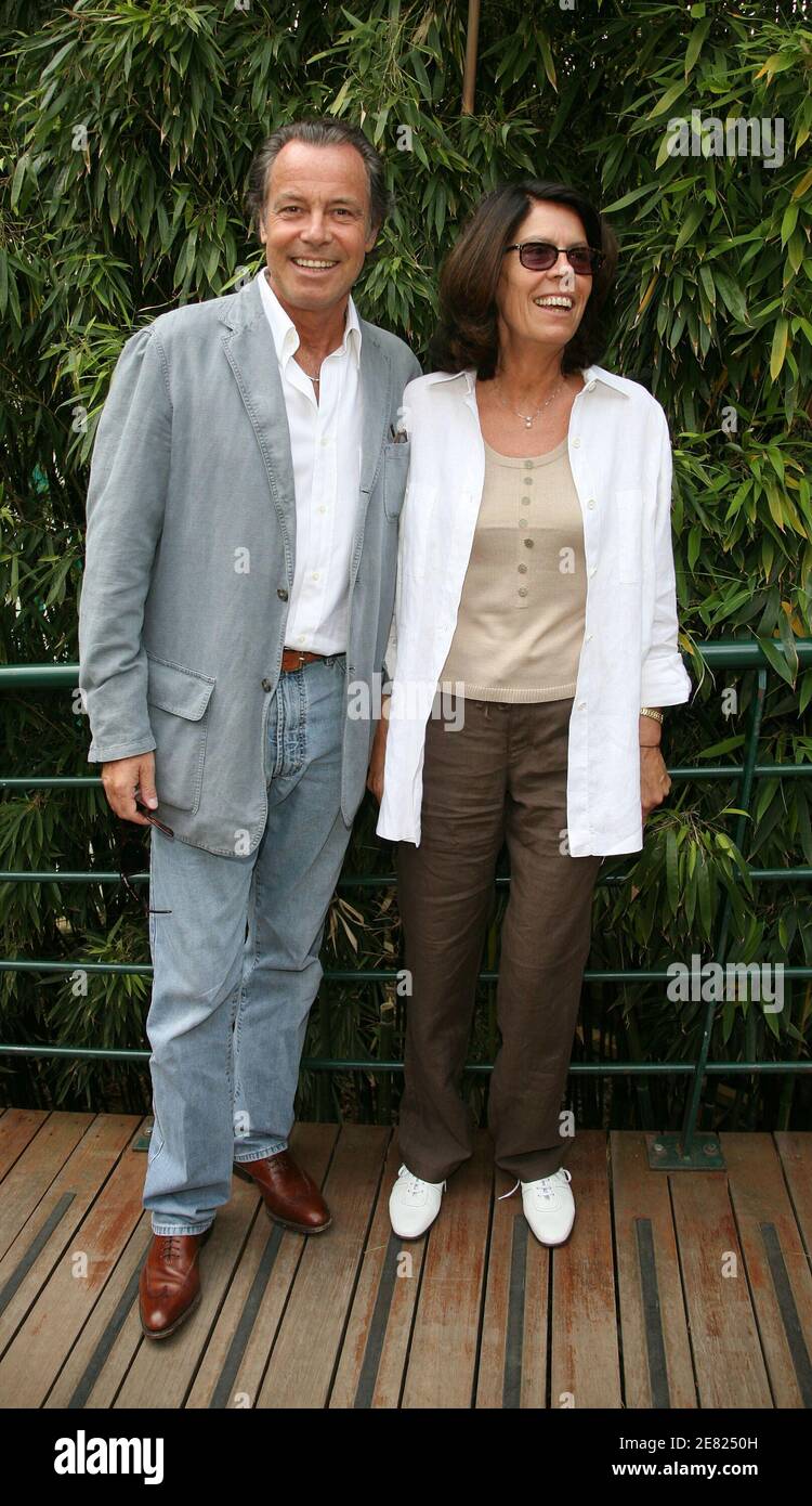 Michel Leeb and his wife Beatrice pose in the 'Village', the VIP area ...