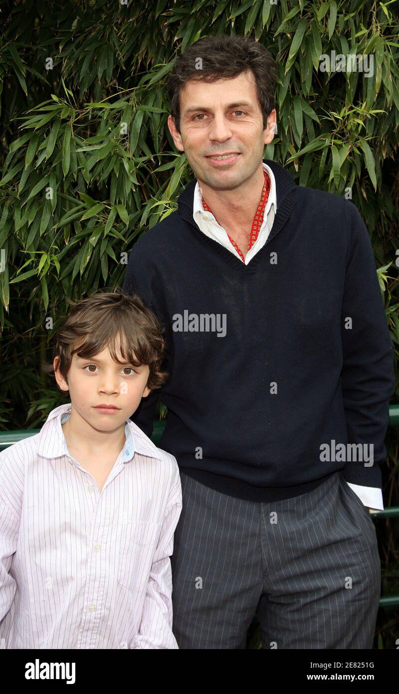 French TV presenter Frederic Taddei and his son Diego pose in the ...