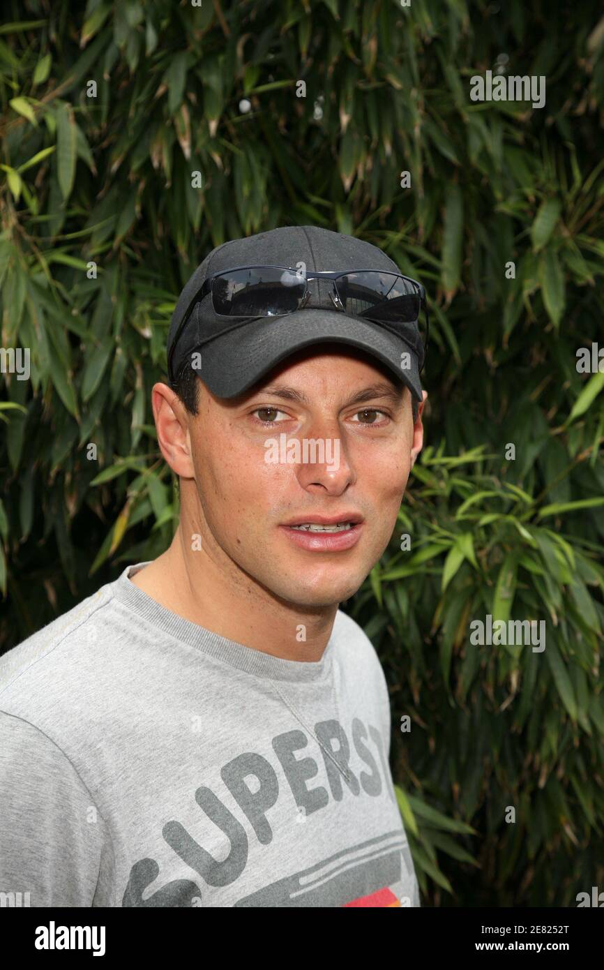 French TV presenter Marc-Olivier Fogiel poses in the 'Village', the VIP ...