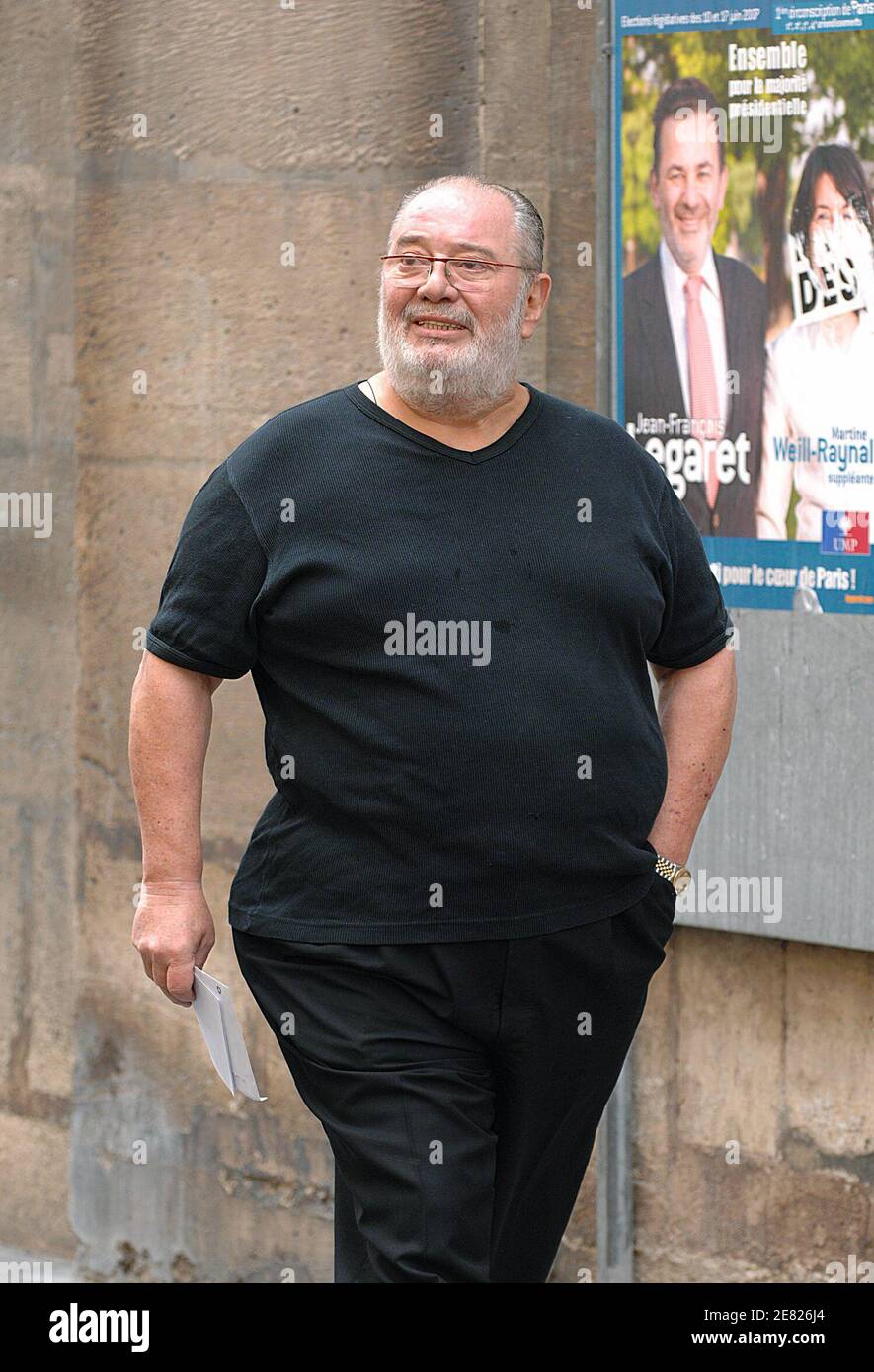 French singer Carlos arrives at the funeral mass for French actor Jean ...