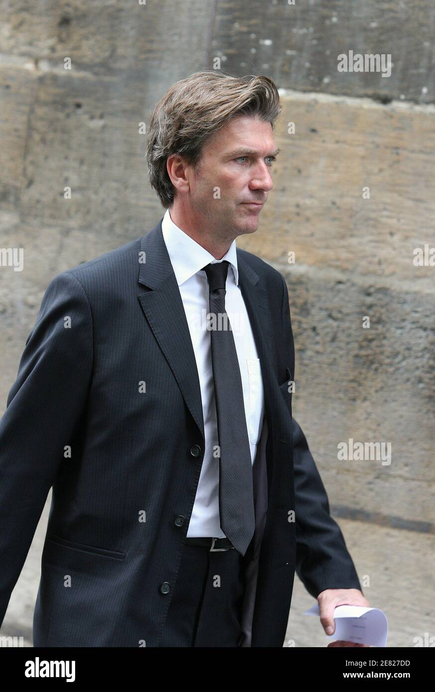 Philippe Caroit arrives at the funeral mass for French actor Jean ...