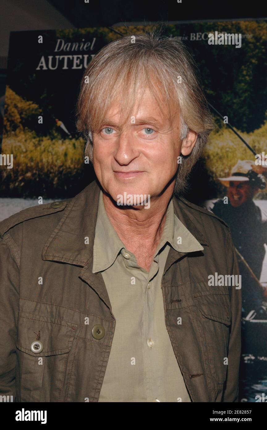 Singer Dave poses for pictures as he arrives to the premiere of ...