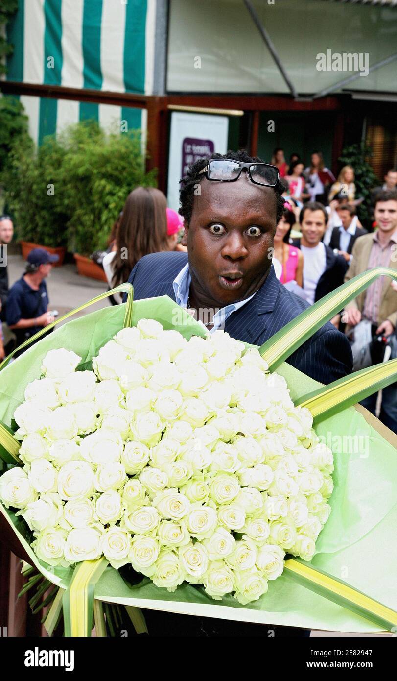 French TV prsesenter Magloire poses in the 'Village', the VIP area of ...
