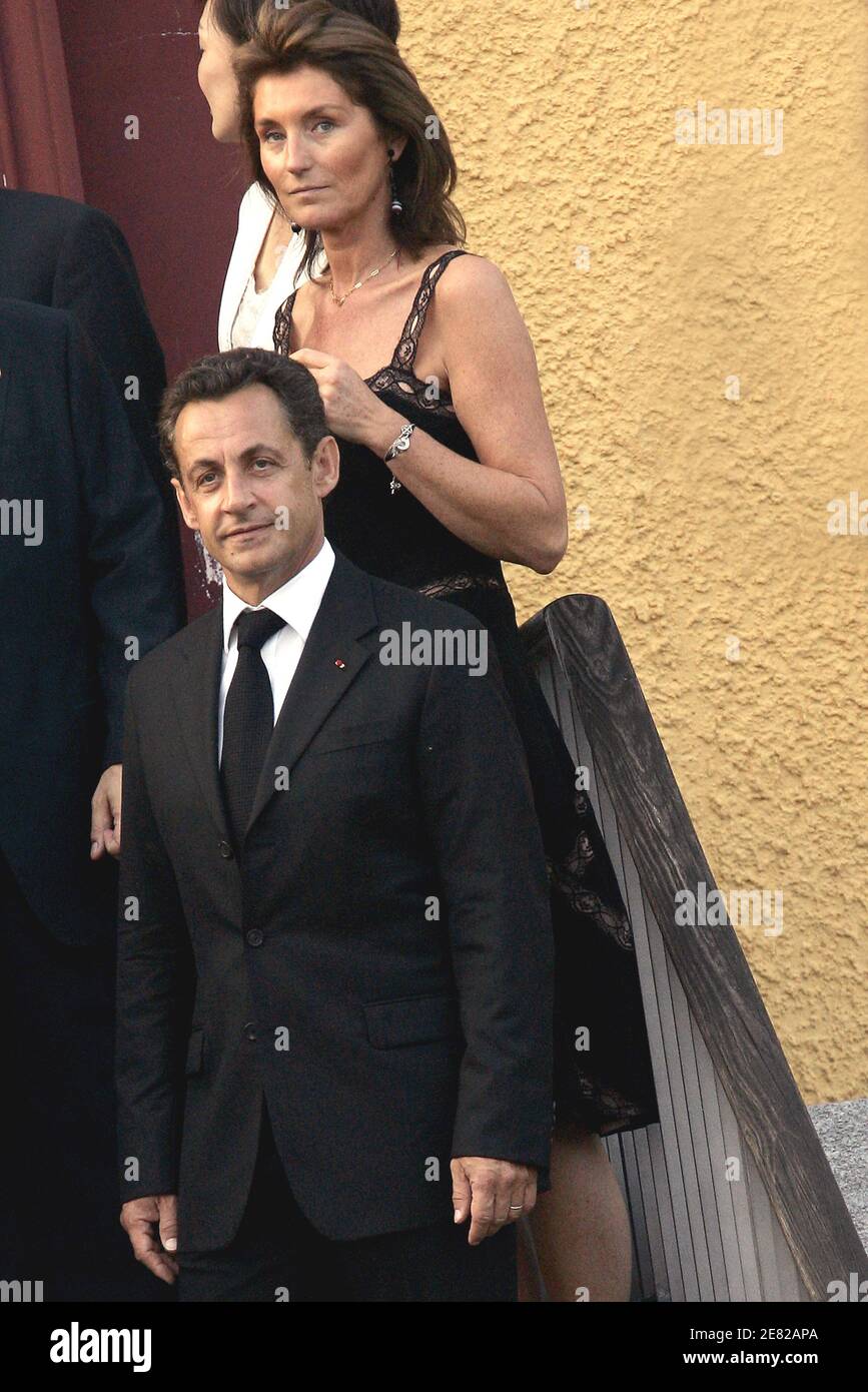 French President Nicolas Sarkozy and his wife Cecilia arrive for an ...