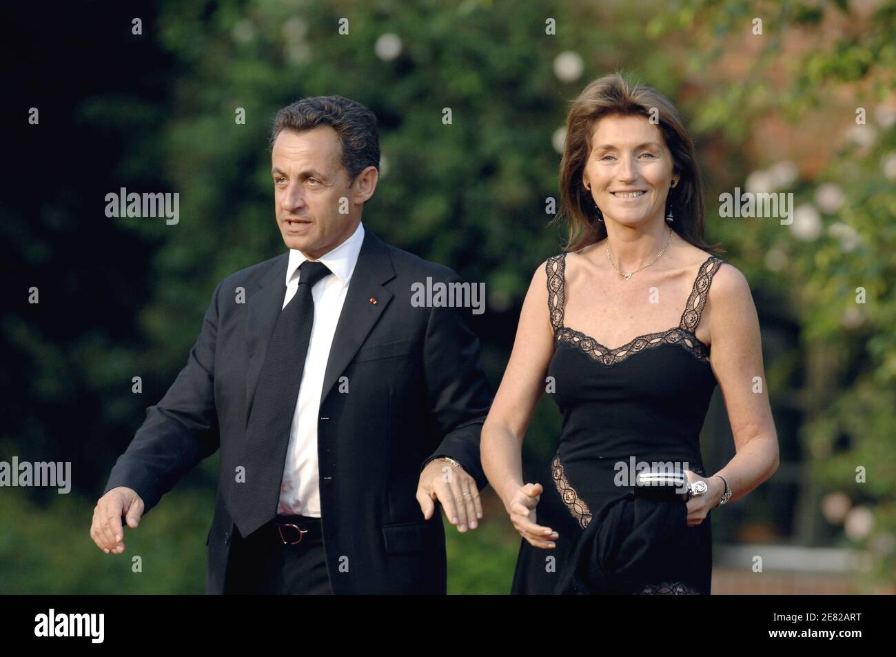 French President Nicolas Sarkozy and his wife Cecilia arrive for an ...